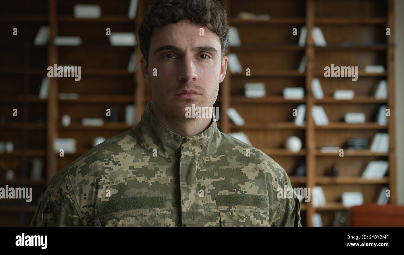 Strong confident determined sad upset Caucasian patriotic soldier man ...