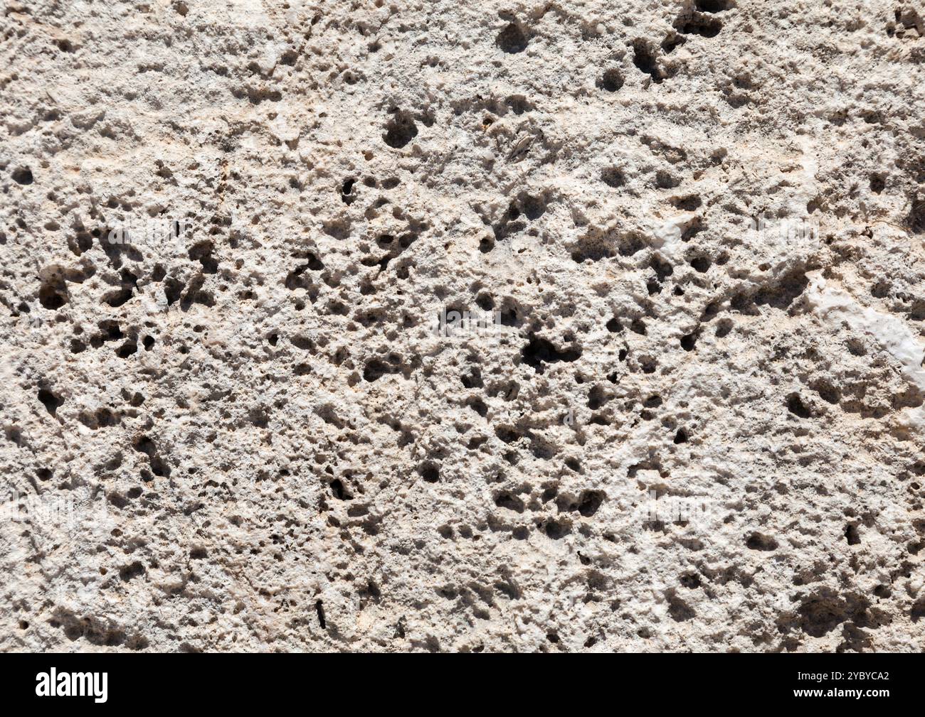 Texture of stone with grooves used for building an ancient fortress ...