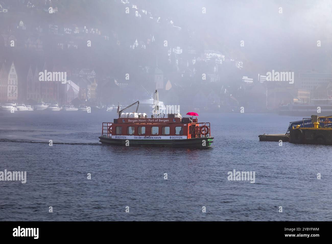 The small harbor ferry Beffen crossing the inner harbor of Bergen ...