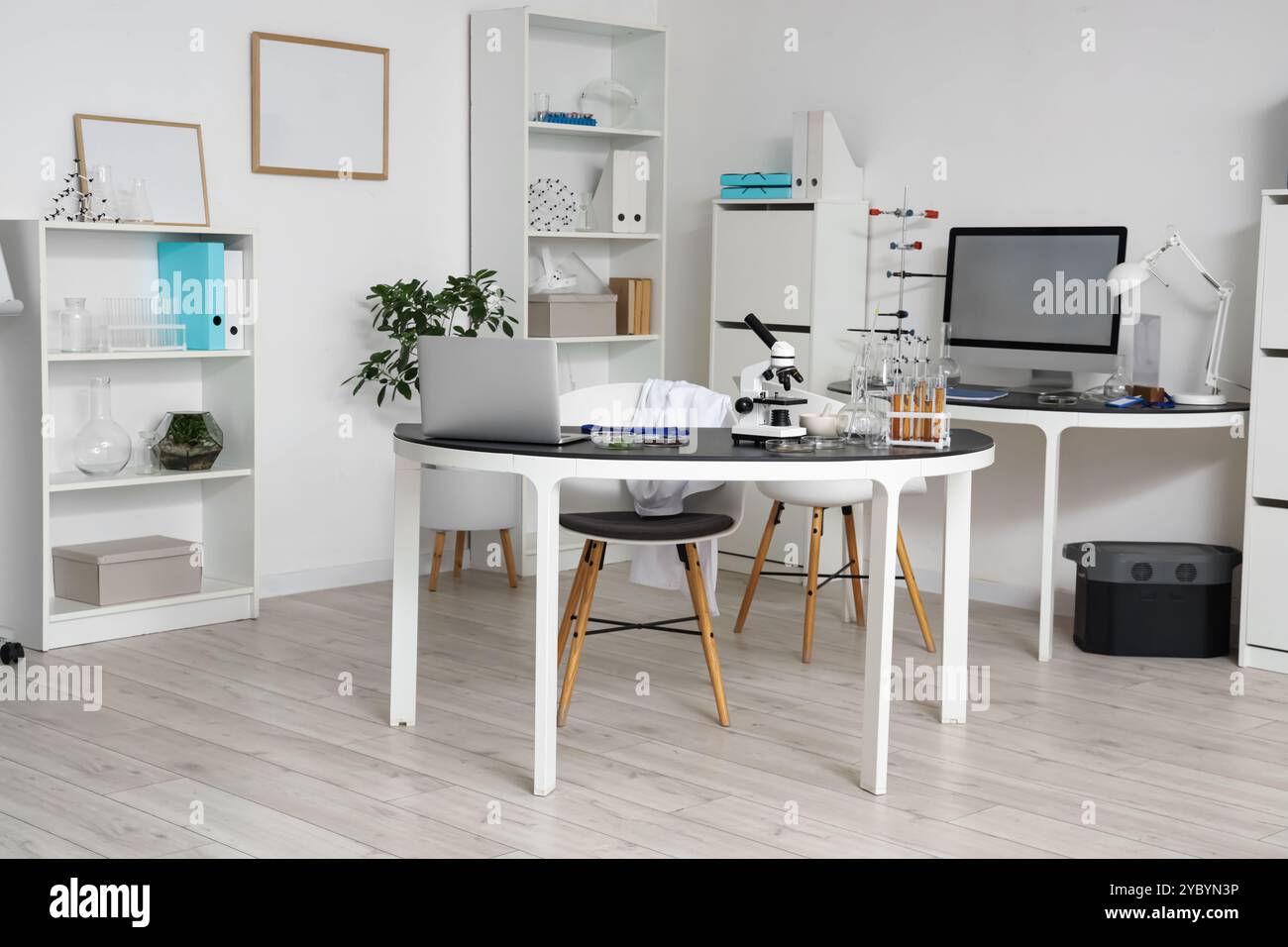 Interior of laboratory with desks and chemical glassware Stock Photo ...