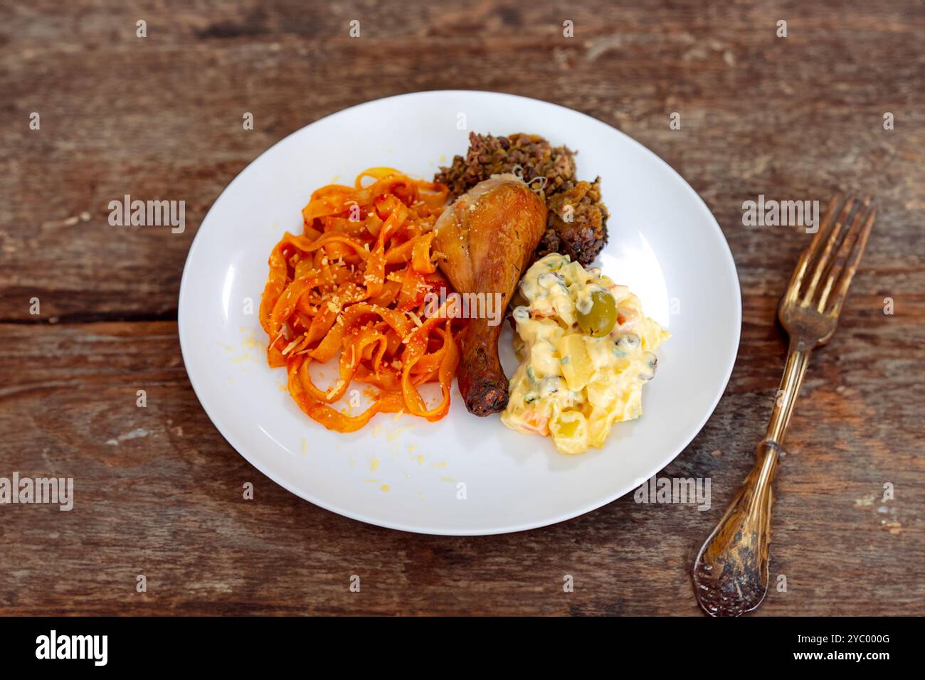 Traditional Brazilian Sunday lunch, pasta, roast chicken and mayonnaise ...
