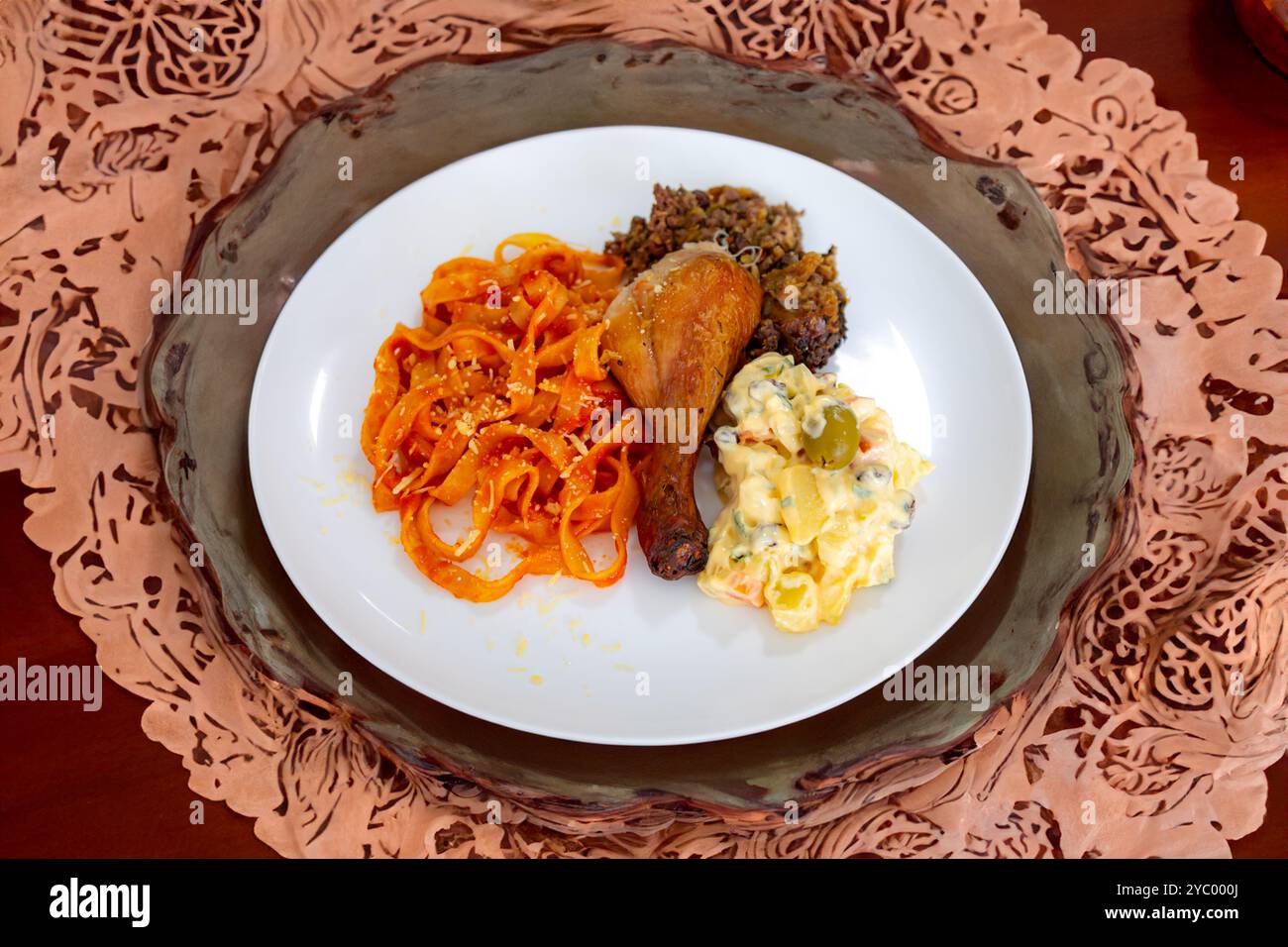Traditional Brazilian Sunday lunch, pasta, roast chicken and mayonnaise ...