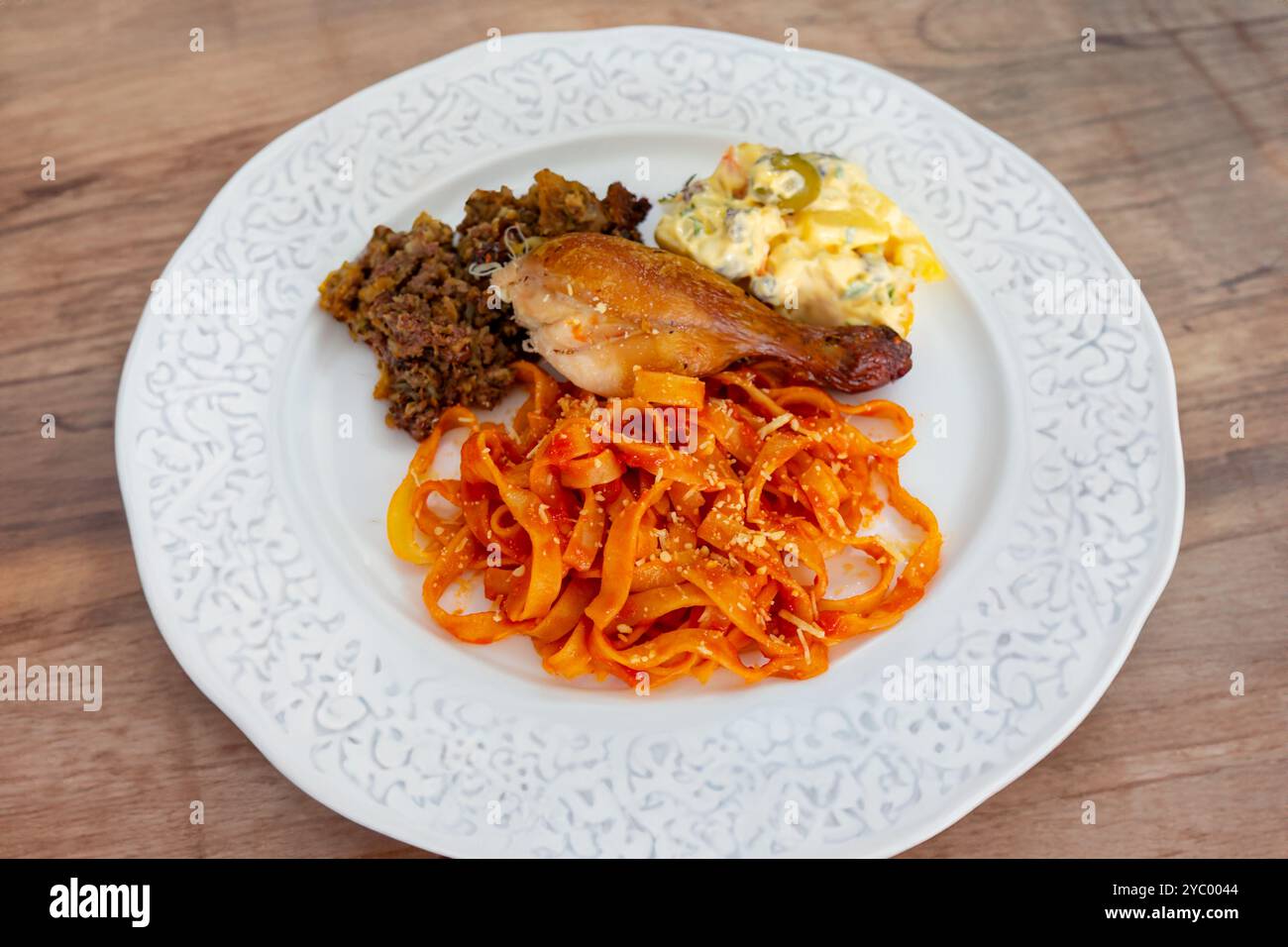 Traditional Brazilian Sunday lunch, pasta, roast chicken and mayonnaise ...