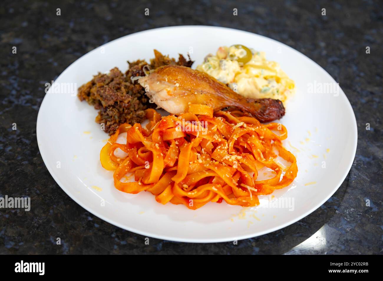 Traditional Brazilian Sunday lunch, pasta, roast chicken and mayonnaise ...