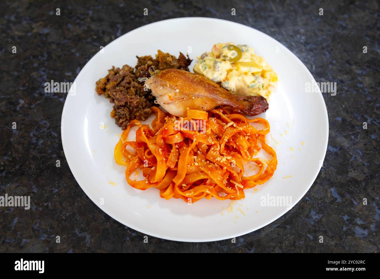 Traditional Brazilian Sunday lunch, pasta, roast chicken and mayonnaise ...