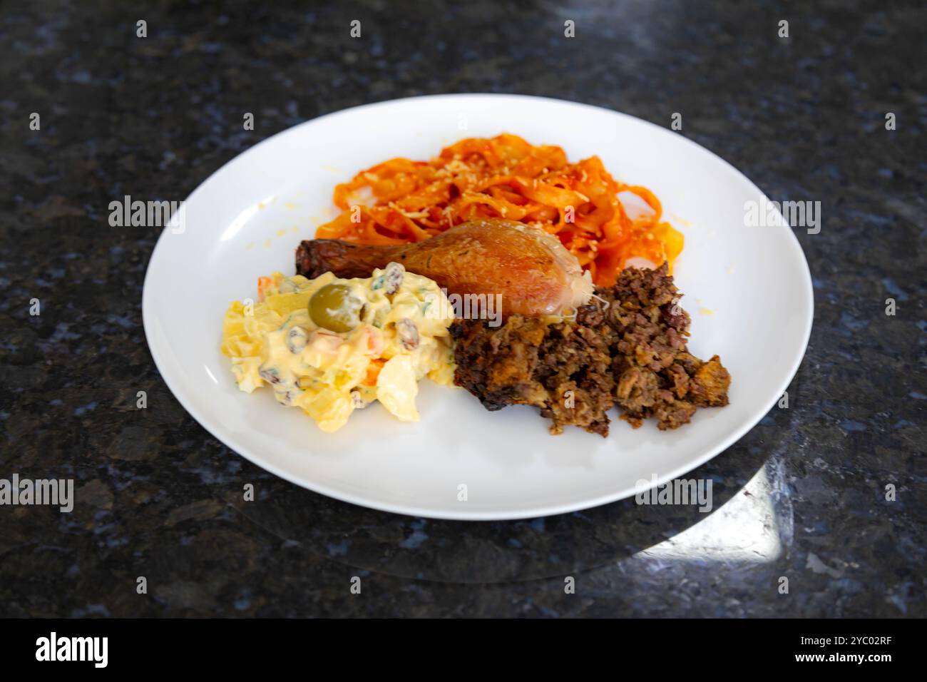 Traditional Brazilian Sunday lunch, pasta, roast chicken and mayonnaise ...