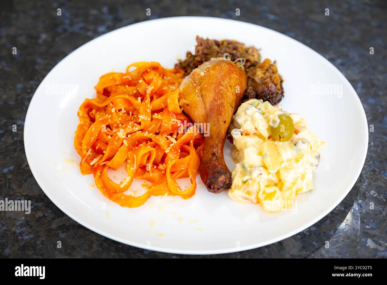 Traditional Brazilian Sunday lunch, pasta, roast chicken and mayonnaise ...