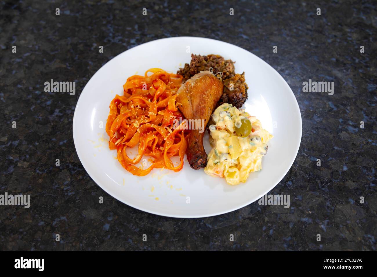 Traditional Brazilian Sunday lunch, pasta, roast chicken and mayonnaise ...