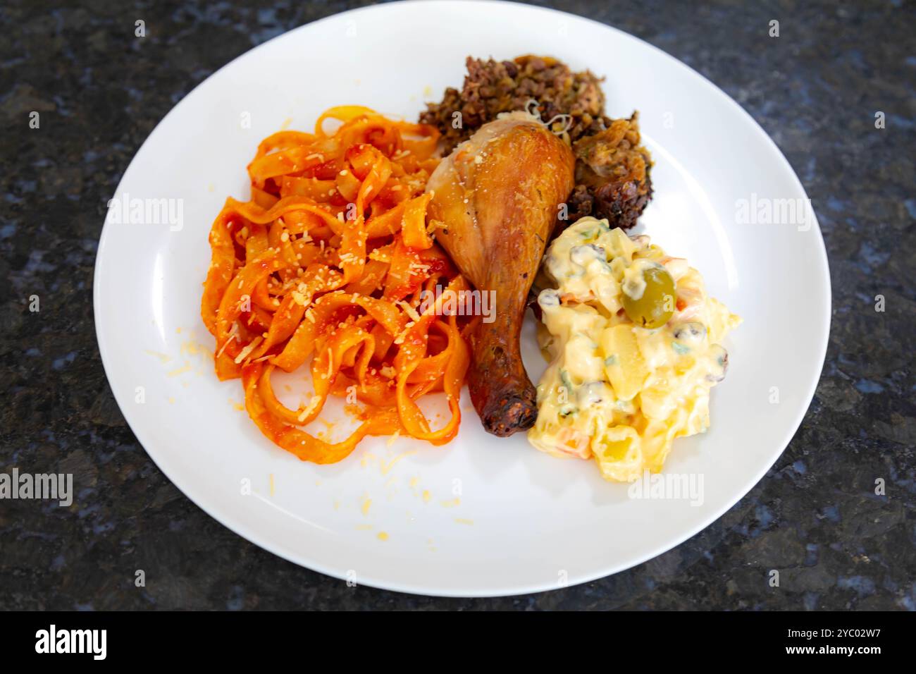 Traditional Brazilian Sunday lunch, pasta, roast chicken and mayonnaise ...