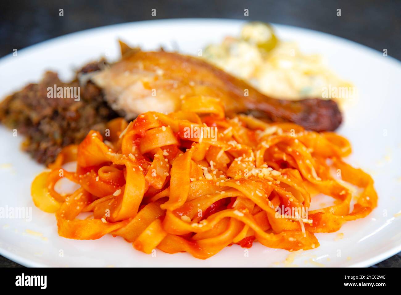 Traditional Brazilian Sunday lunch, pasta, roast chicken and mayonnaise ...
