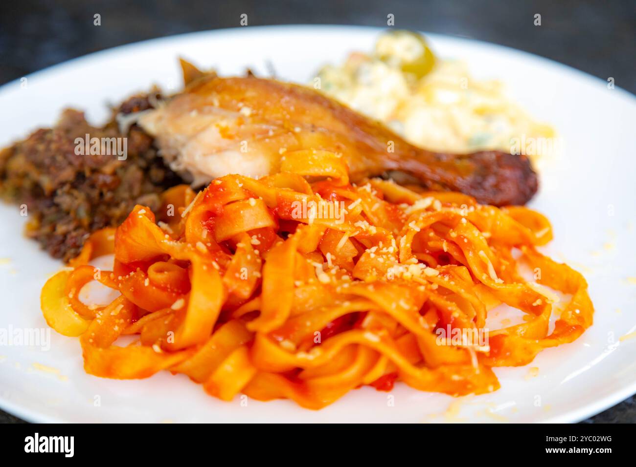 Traditional Brazilian Sunday lunch, pasta, roast chicken and mayonnaise ...
