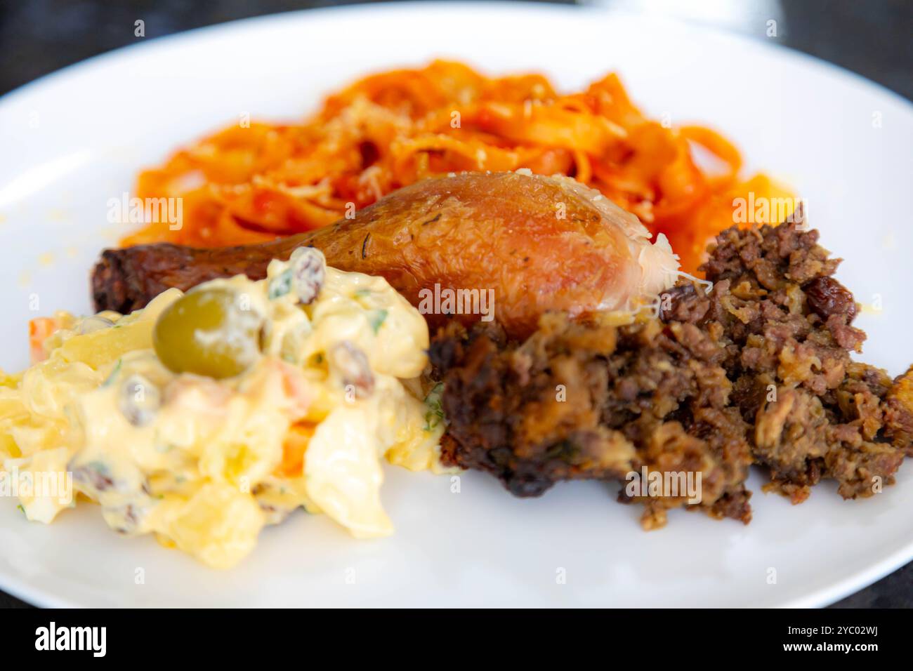Traditional Brazilian Sunday lunch, pasta, roast chicken and mayonnaise ...