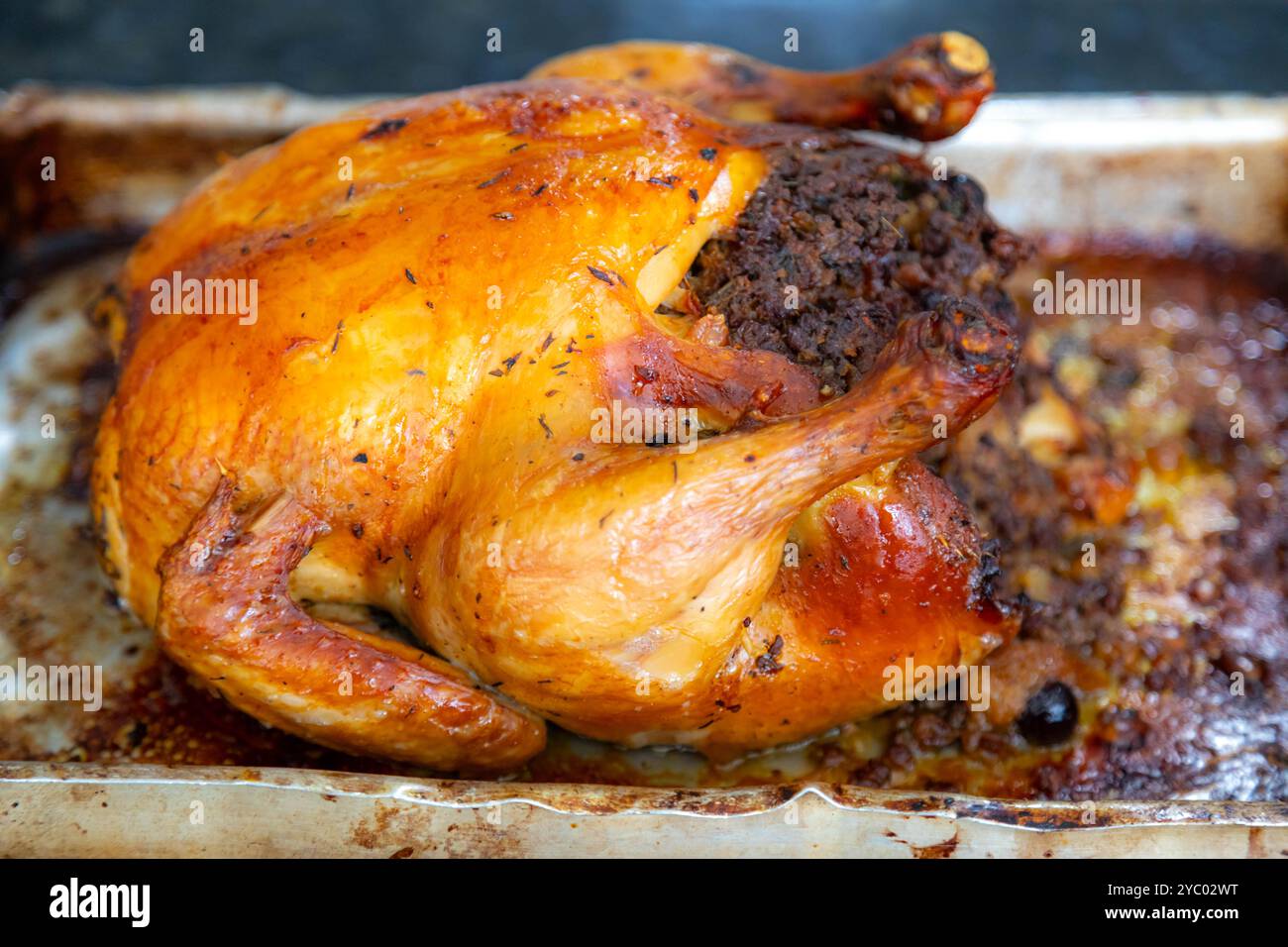 Rustic roast chicken stuffed with farofa Stock Photo - Alamy