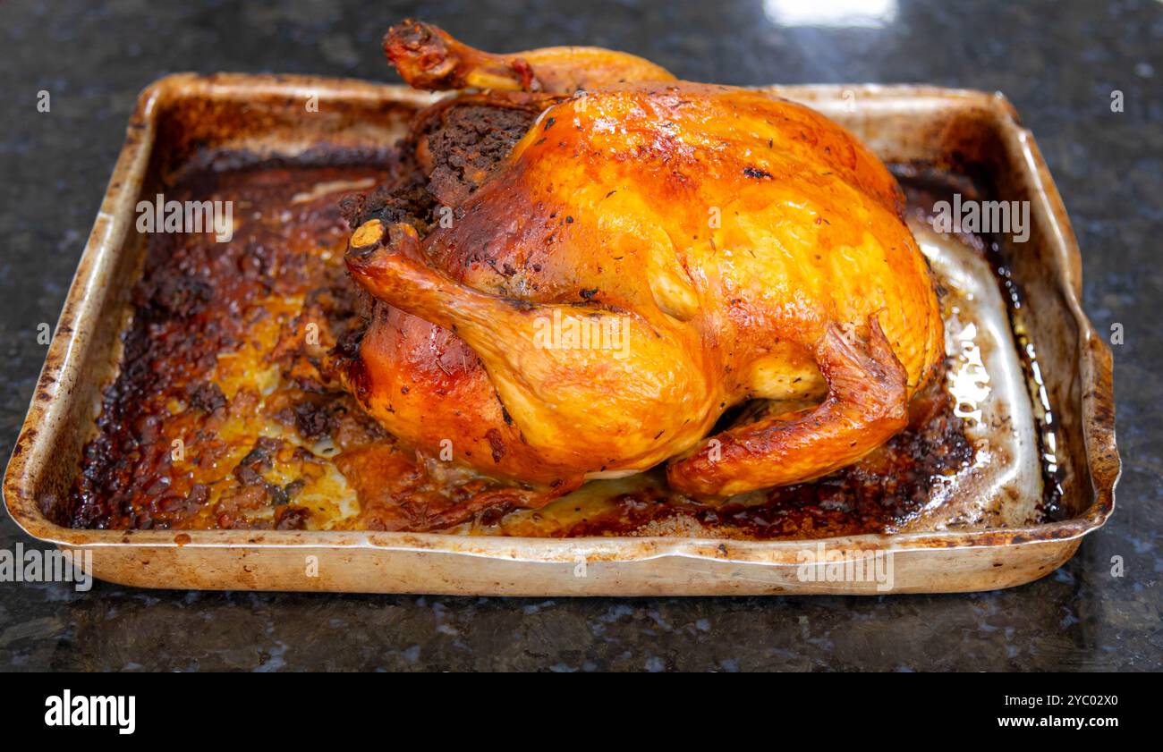 Rustic roast chicken stuffed with farofa Stock Photo - Alamy