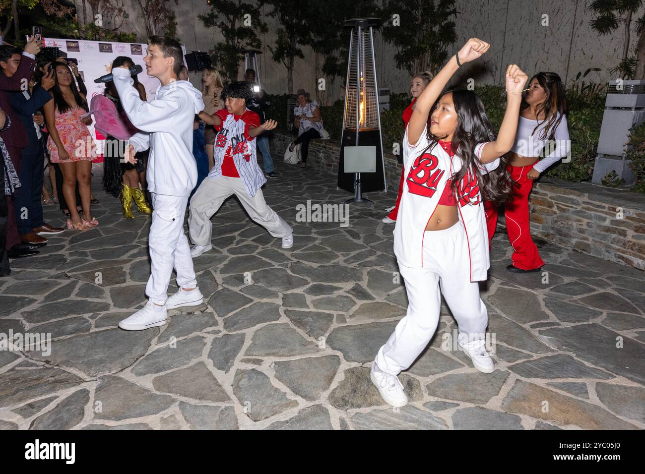 Singer Justice Haller with dancers performs at Drisha's Closet Rooftop ...