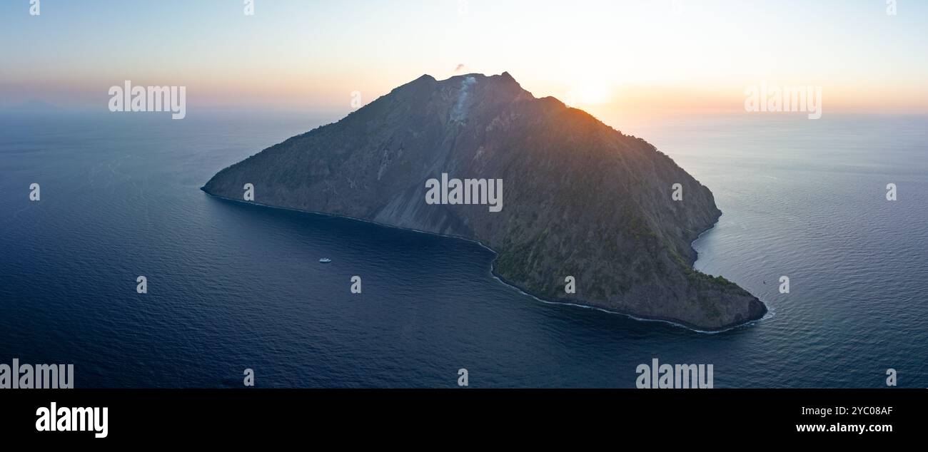 The remote and scenic island of Komba, an active volcano, lies about 70 ...
