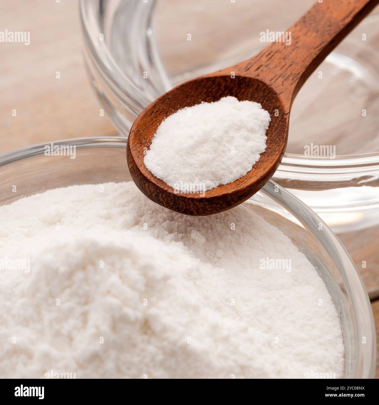 Baking soda powder in a spoon and bowl with vinegar - Healthy food ...