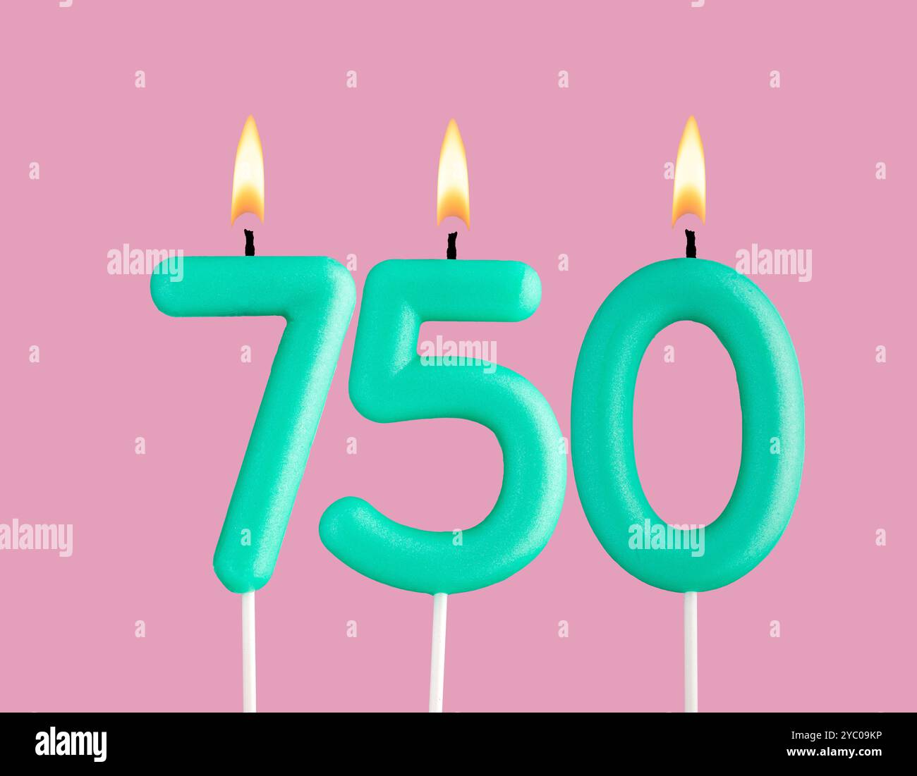 Green candle number 750 - Birthday card on pastel pink background Stock ...