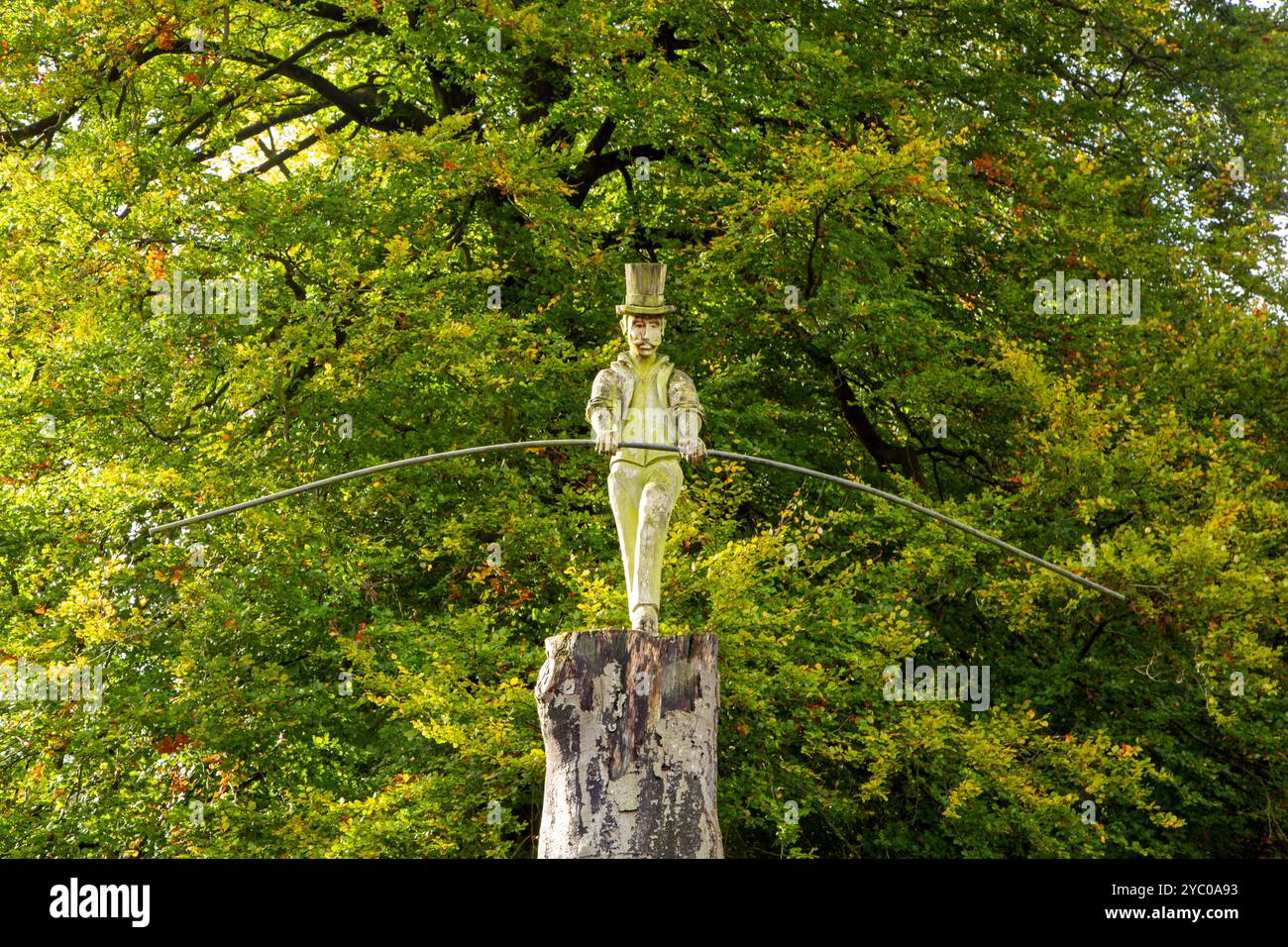 Wood carving statue commemorating the 1864 walk accros Rudyard Lake in ...