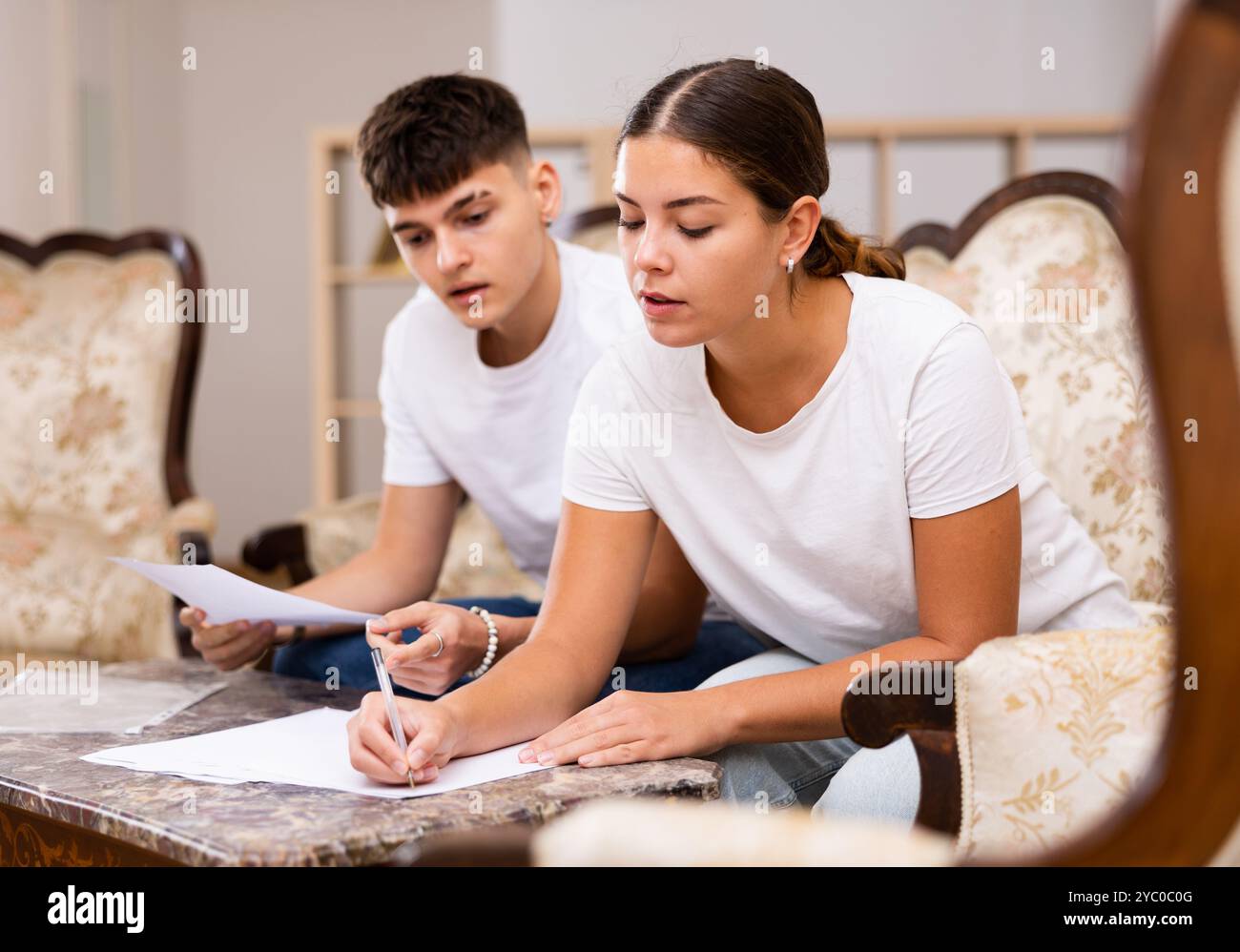 Man sorting out bills hi-res stock photography and images - Alamy