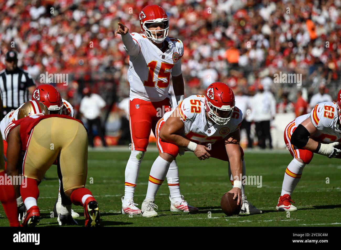 Kansas City Chiefs quarterback Patrick Mahomes (15) gestures behind ...