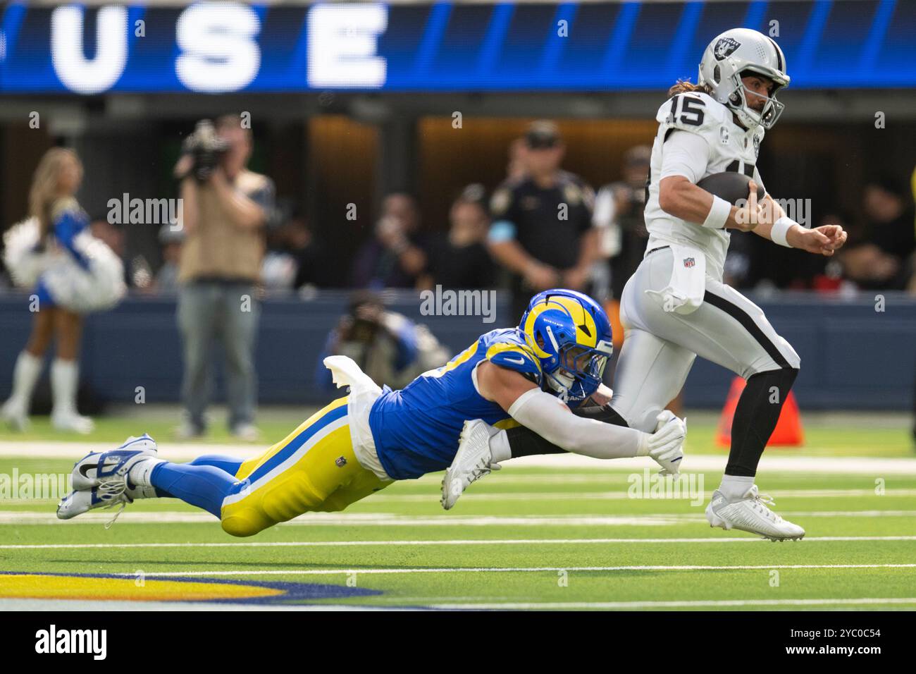 Los Angeles Rams linebacker Michael Hoecht (97) tackles Las Vegas ...