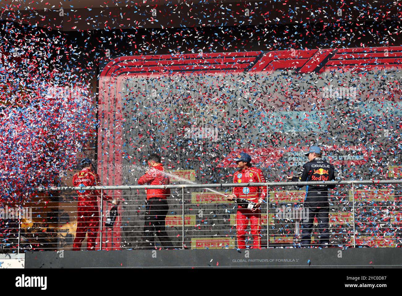 The podium (L to R): Ravin Jain (GBR) Ferrari Strategy Director; Carlos ...