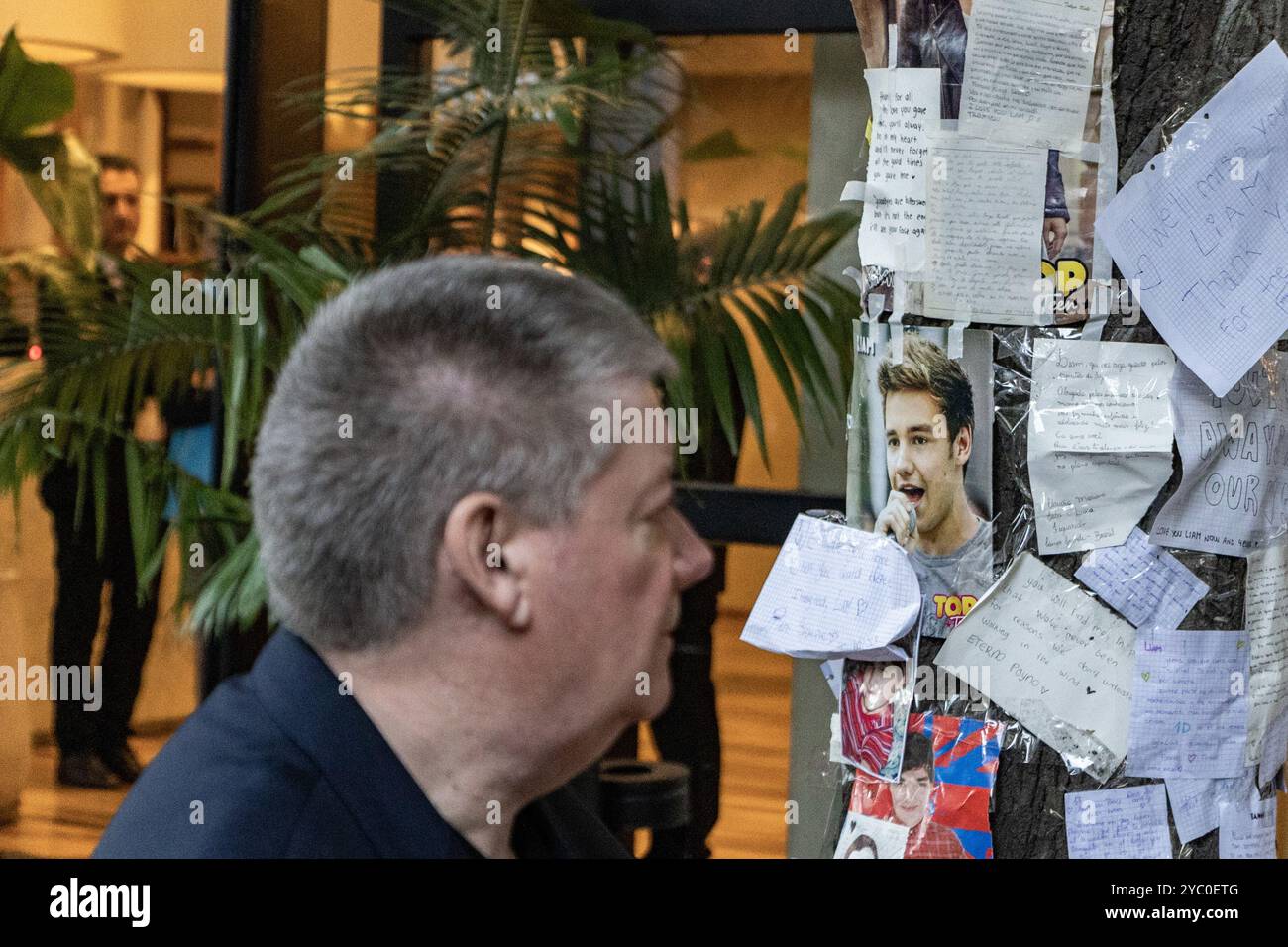Liam's father, Geoff Payne, walks around the altar erected in tribute ...
