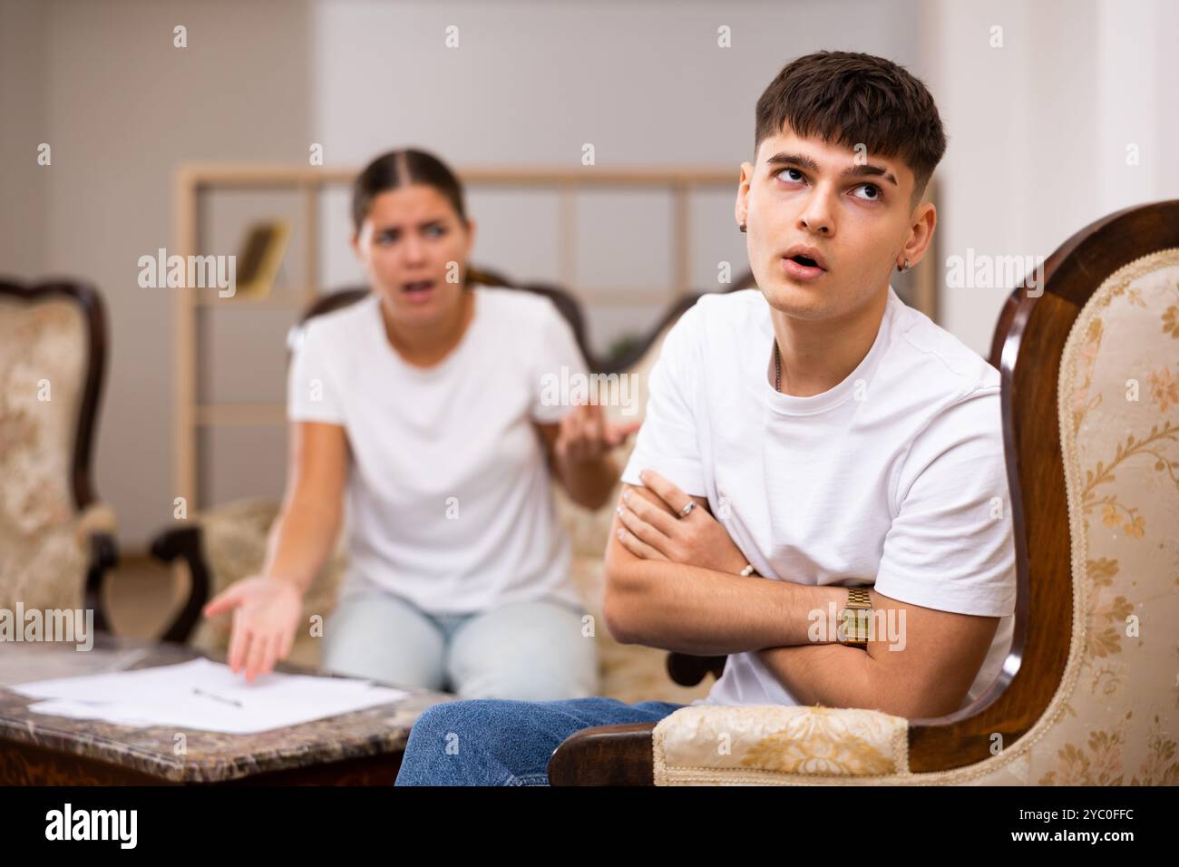 Angry young woman swears at her spouse Stock Photo - Alamy