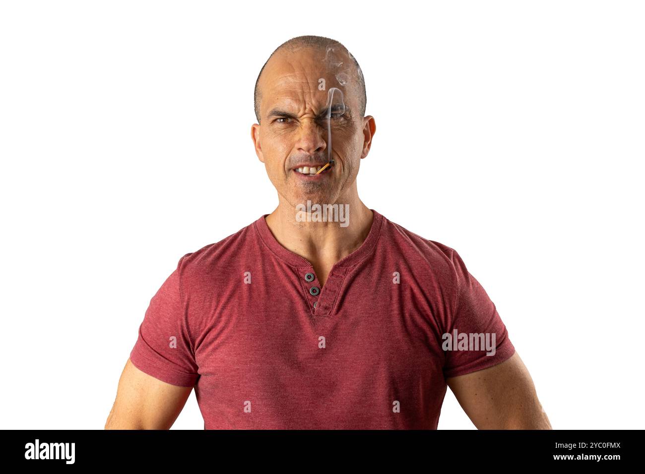 48 year old Brazilian man, facing the camera and with a lit match in ...