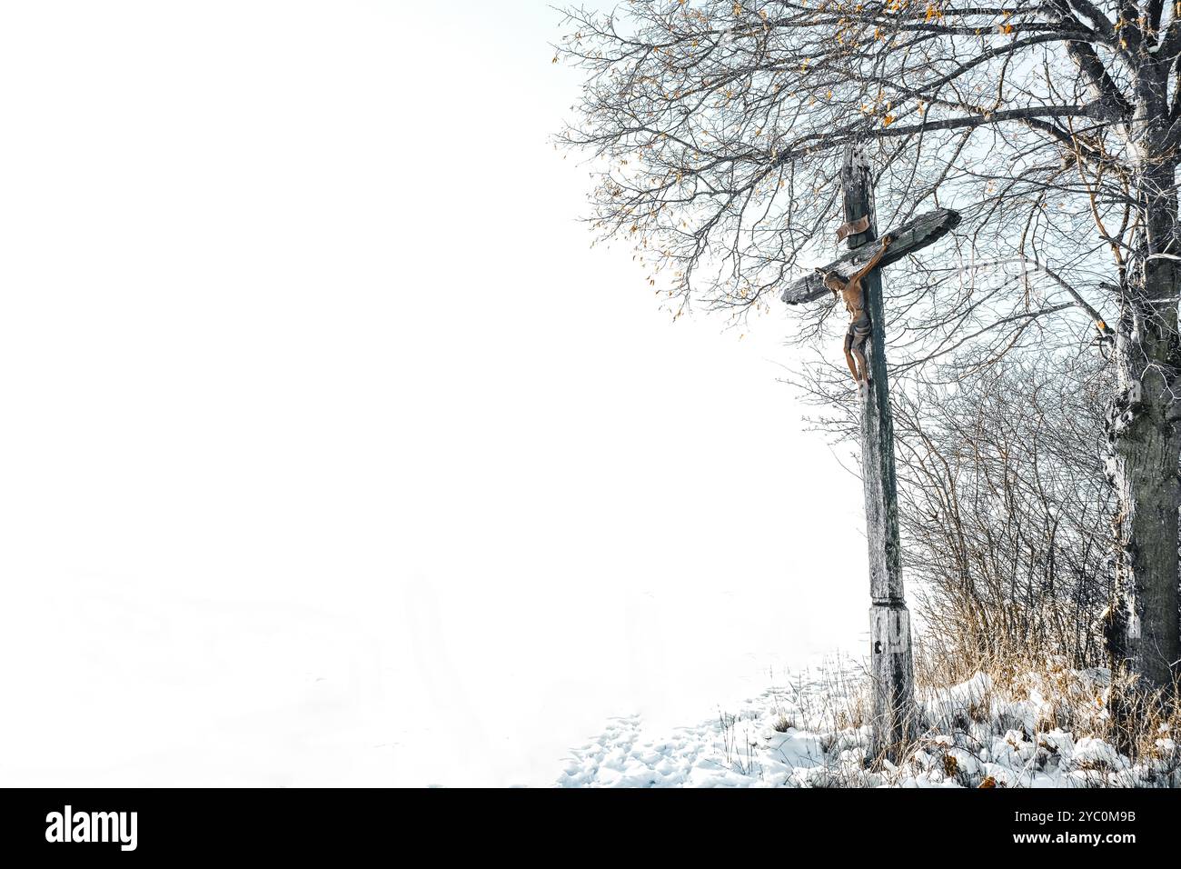 Christmas religious background.Wooden cross with statue of jesus christ ...