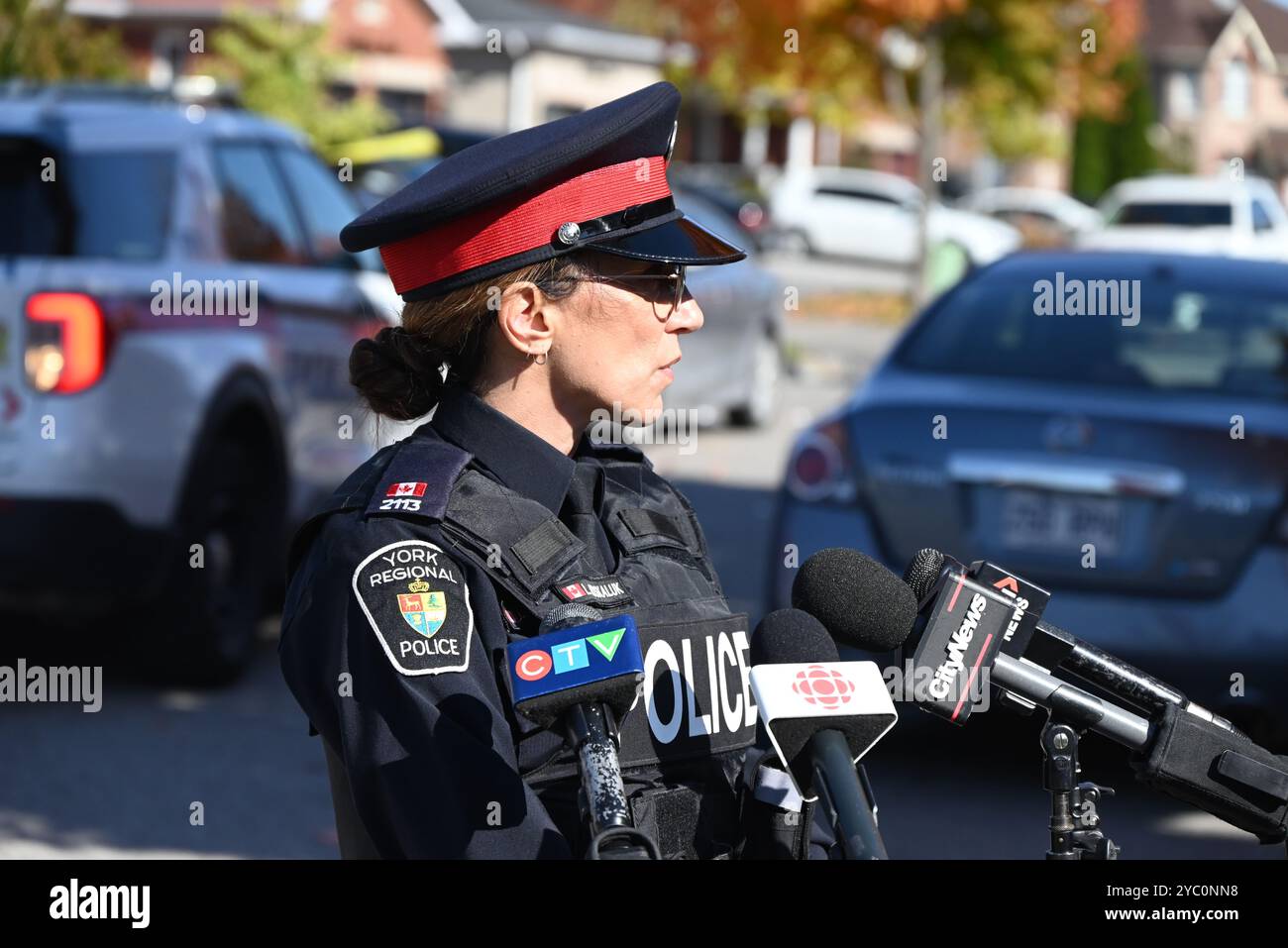 Constable Lisa Moskaluk answers questions from the media to provide an ...