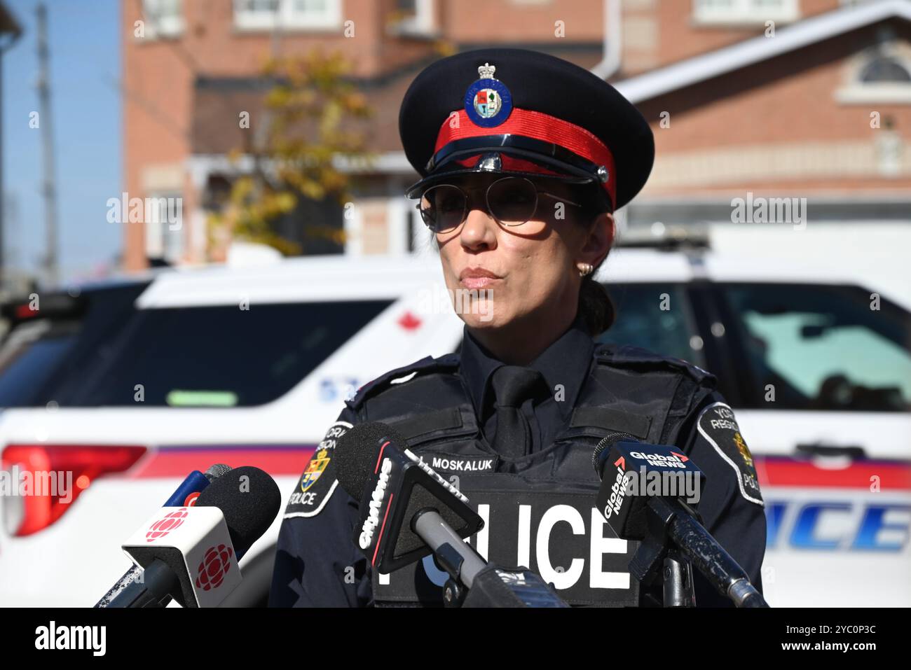 Constable Lisa Moskaluk answers questions from the media to provide an ...