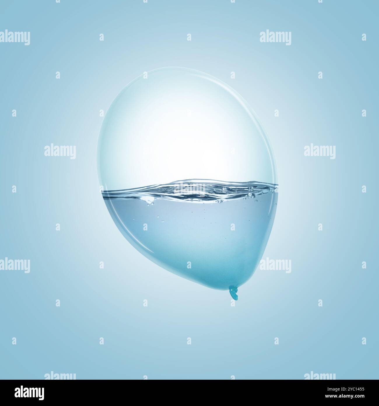 Balloon with water inside on light blue background Stock Photo - Alamy