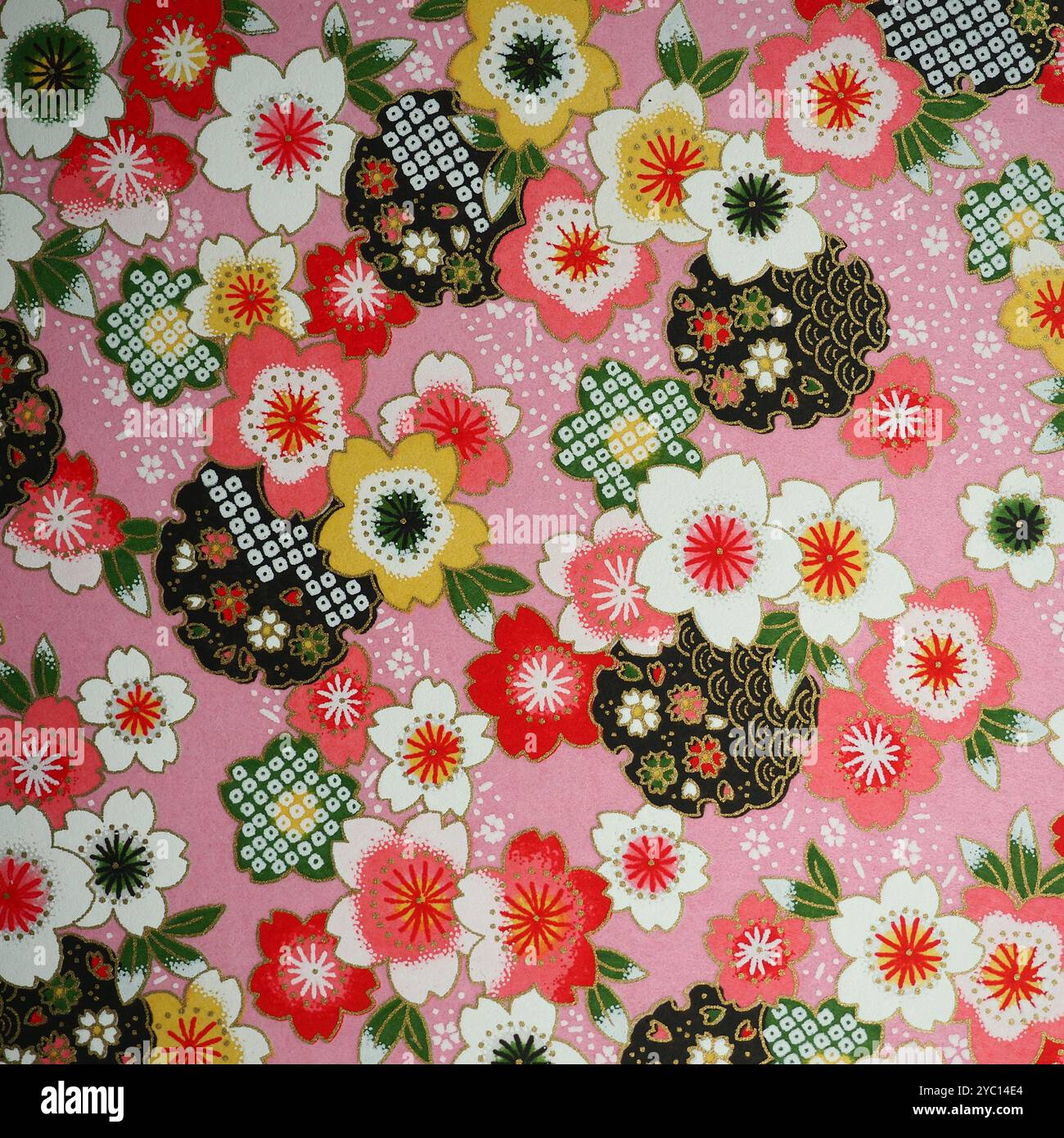 Traditional Japanese patterns with floral theme on pink background ...