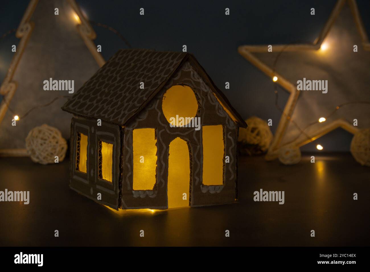 Lighted cardboard house gift hi-res stock photography and images - Alamy