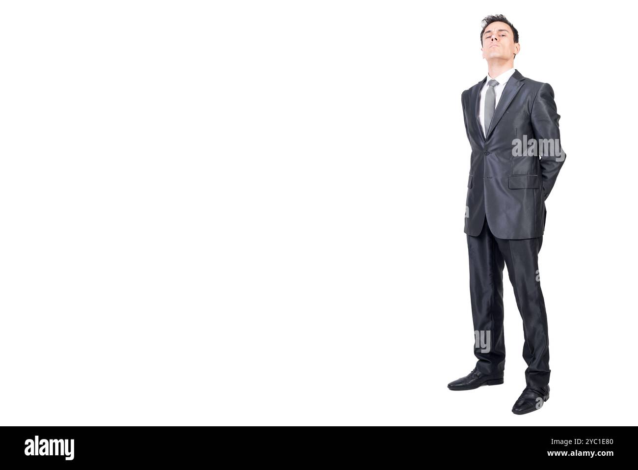Strict man in elegant suit. White background Stock Photo - Alamy