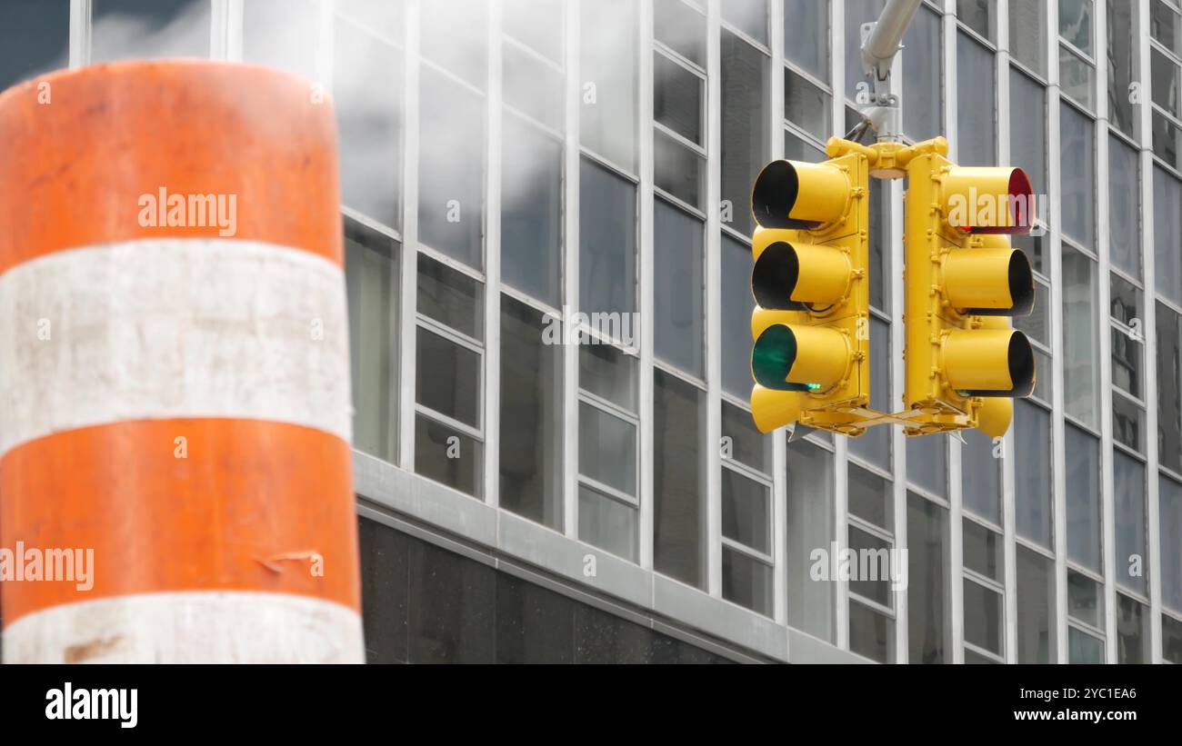 Steam vapor vented on New York City Water street, orange vapour tube ...
