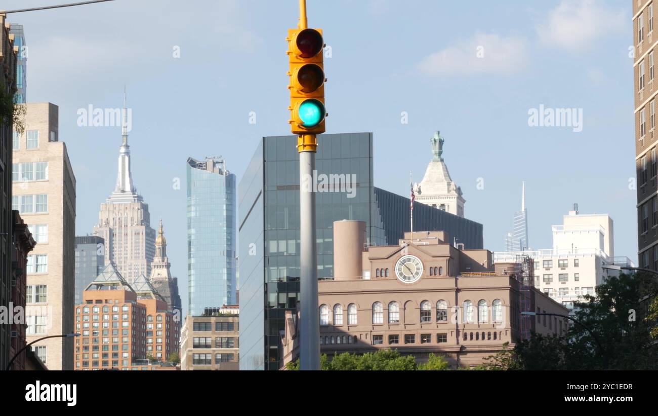 New York City street crossroad, yellow traffic light, transport road ...
