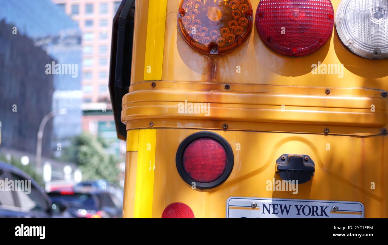 Yellow School Bus on New York Manhattan street, schoolbus truck on busy ...