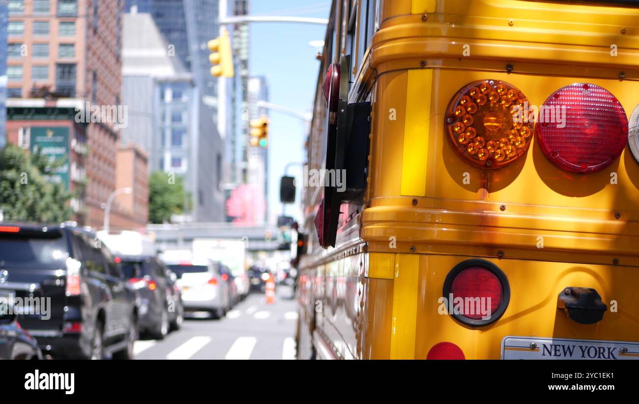 Yellow School Bus on New York Manhattan street, schoolbus truck on busy ...