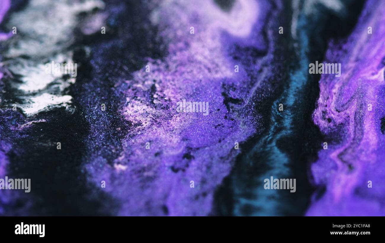 Liquid galaxy. Fluid glitter drip. Defocused purple black white color ...