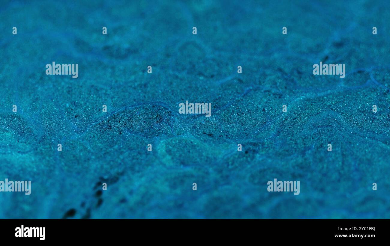 Fluid glitter splatter. Acrylic gel texture. Defocused bright blue ...