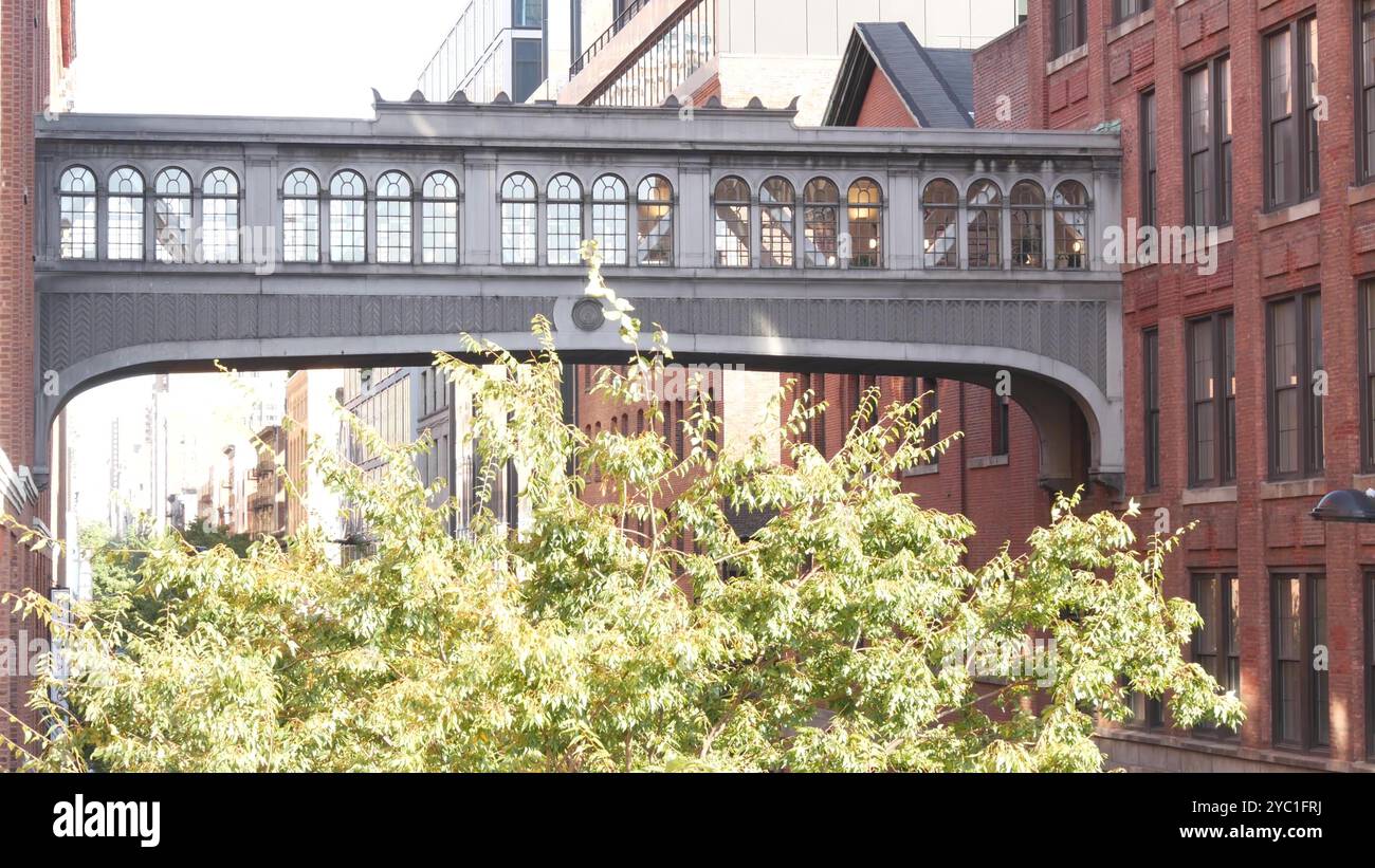 New York City street, Chelsea Market skybridge. Retro industrial ...