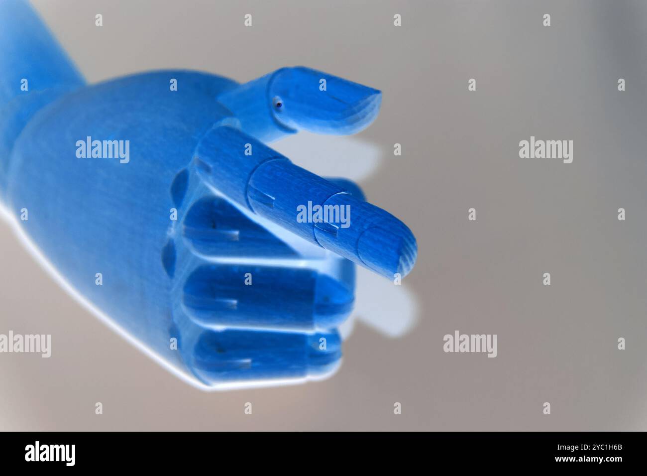 Robot hand pointing with index finger isolated on transparent ...