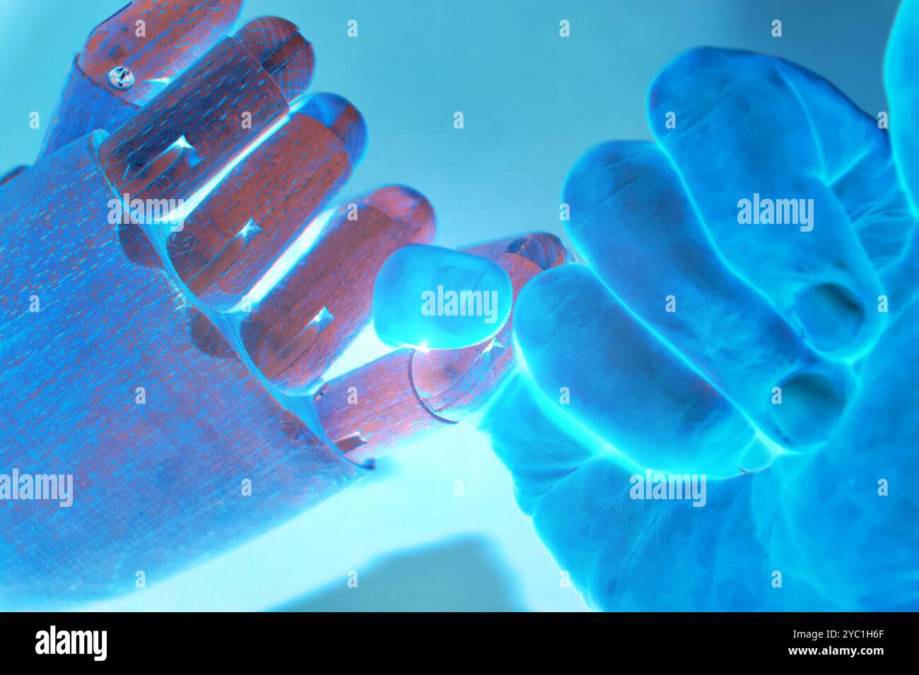 Human hand and robot hand with pinky swear gesture. Concept of Human ...