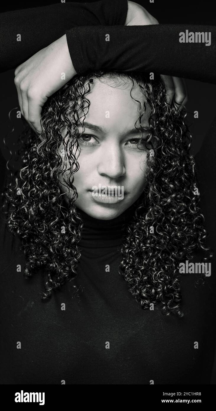 16x9 Close Up Young Black Woman Edgy Emotional Black and White Stock ...