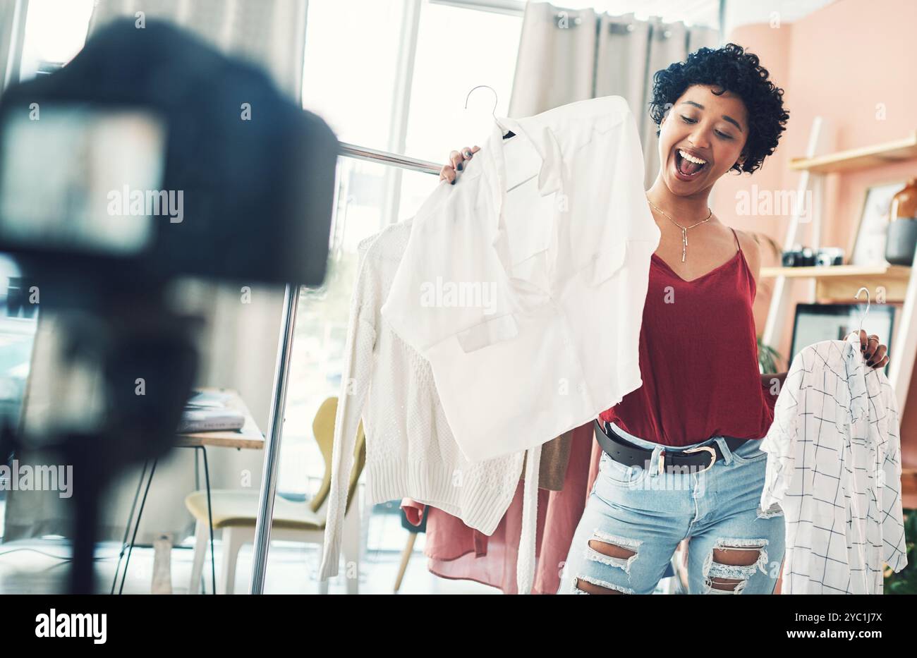 Influencer, woman and and clothes with camera at house of live ...