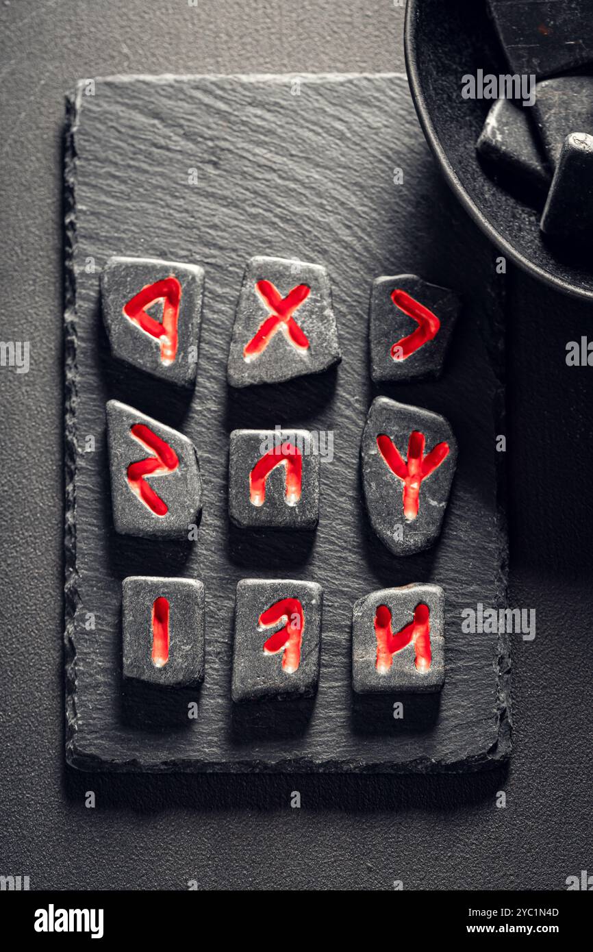 Top view of old divination by rune stones based on antique futhark ...