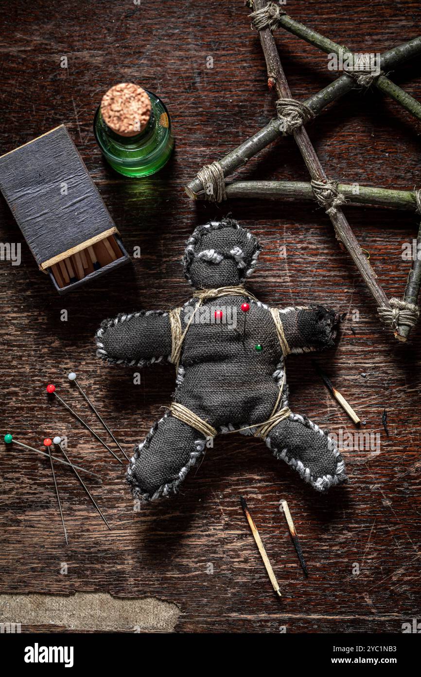Voodoo doll pierced needle hi-res stock photography and images - Alamy